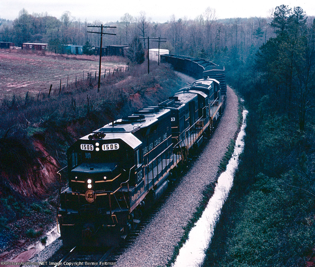 Seaboard Coast Line GP40 #1506, U30B #1703 & U33B #1745 lead southbound train #329